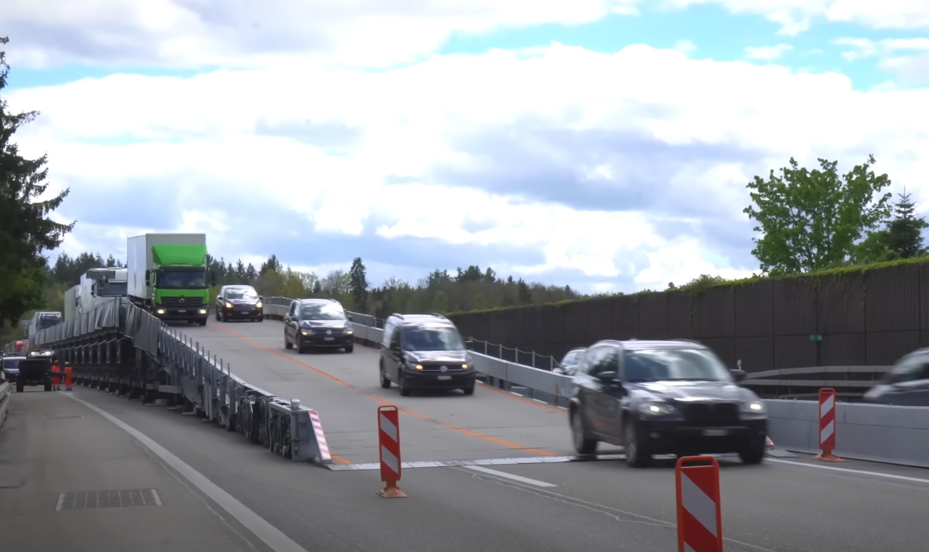 Mobile Bridge in Switzerland Lets Cars Drive Over Road Repairs